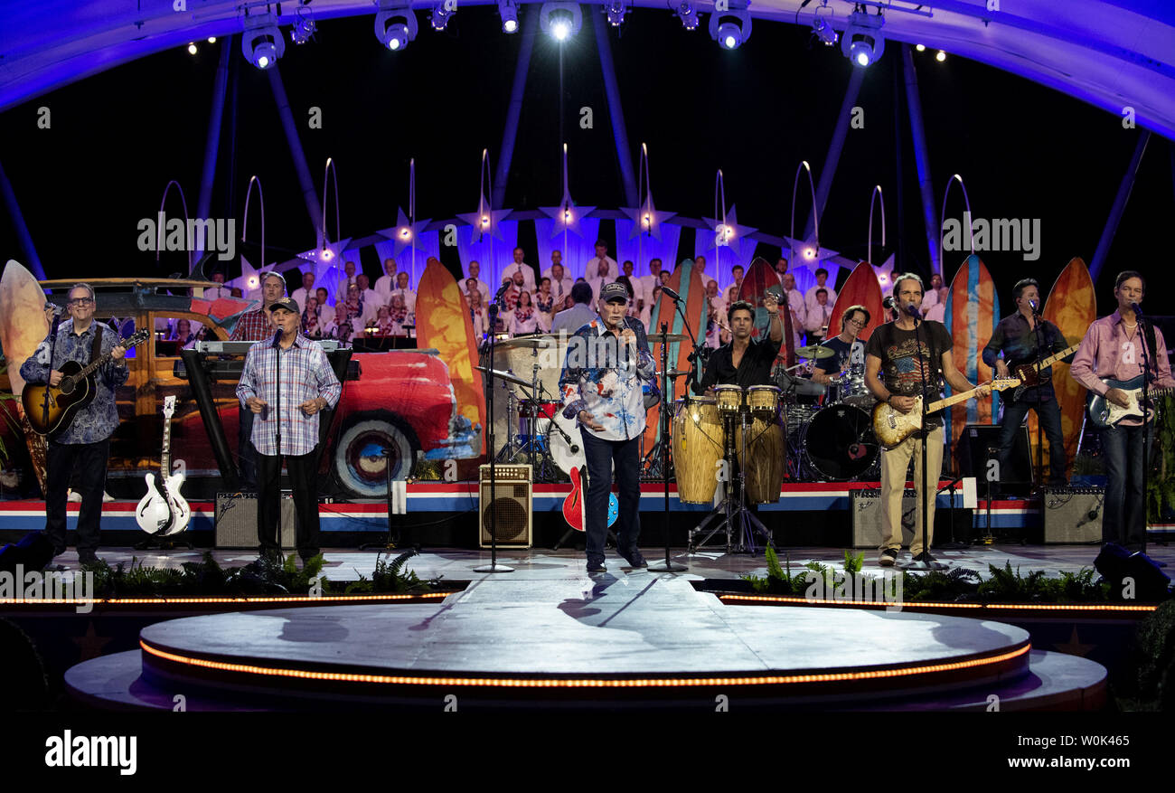The Beach Boys with lead singer Mike Love (C) perform during a dress ...