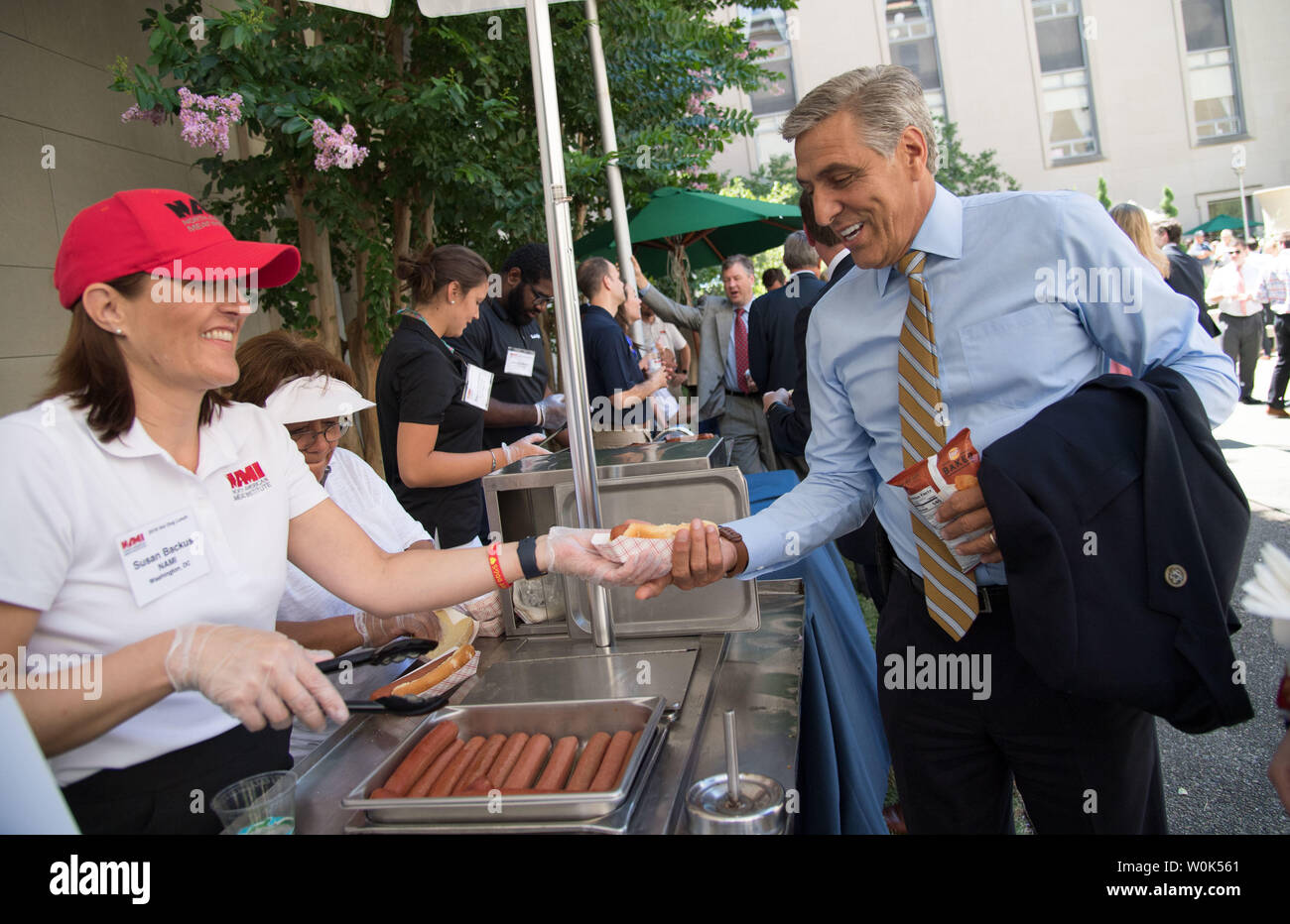 Rep. Lou Barletta, R-PA, takes a hot dog at the Congressional Hot Dog ...