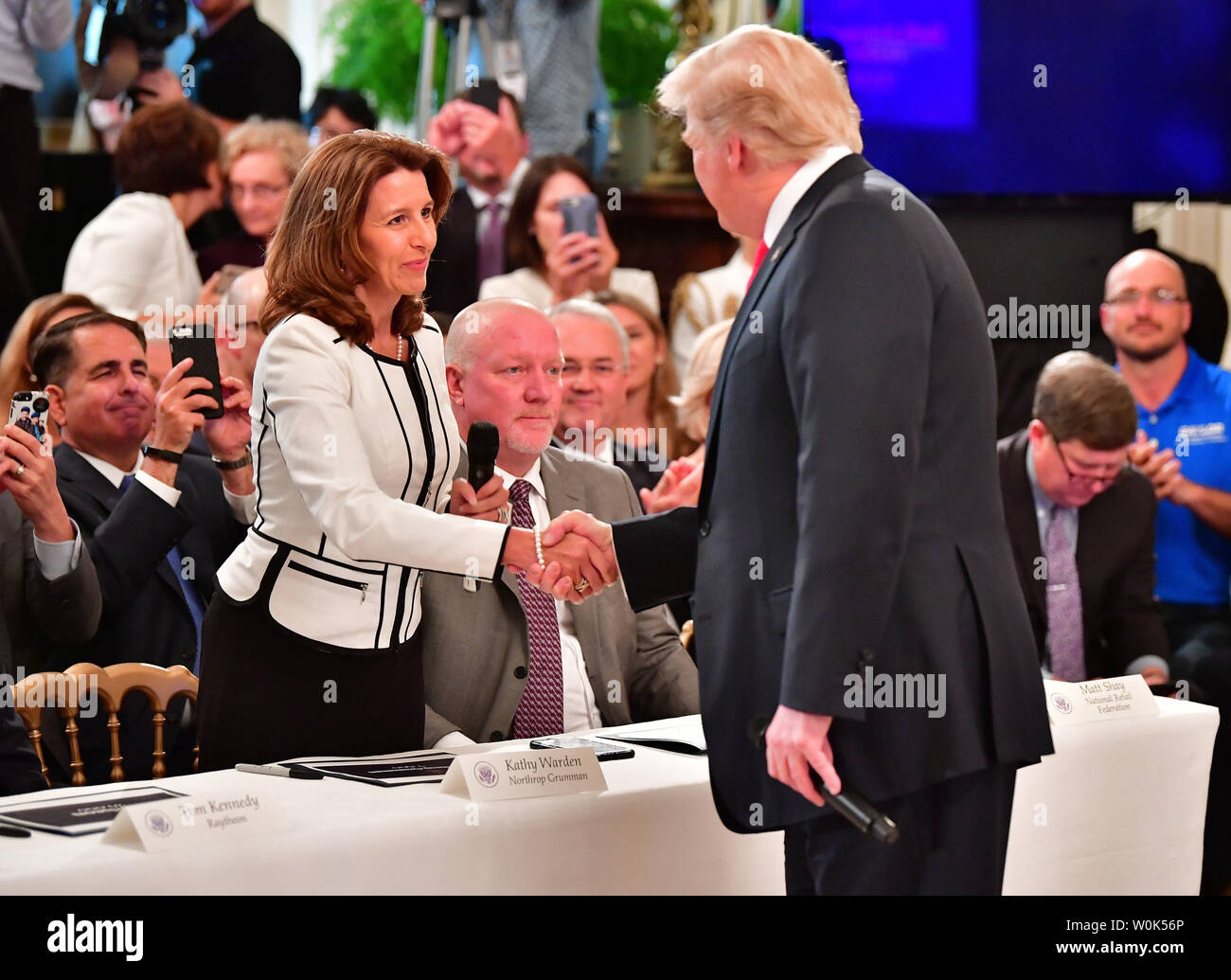 Kathy Warden, CEO of Northrop Grumman, speaks to President Donald Trump ...