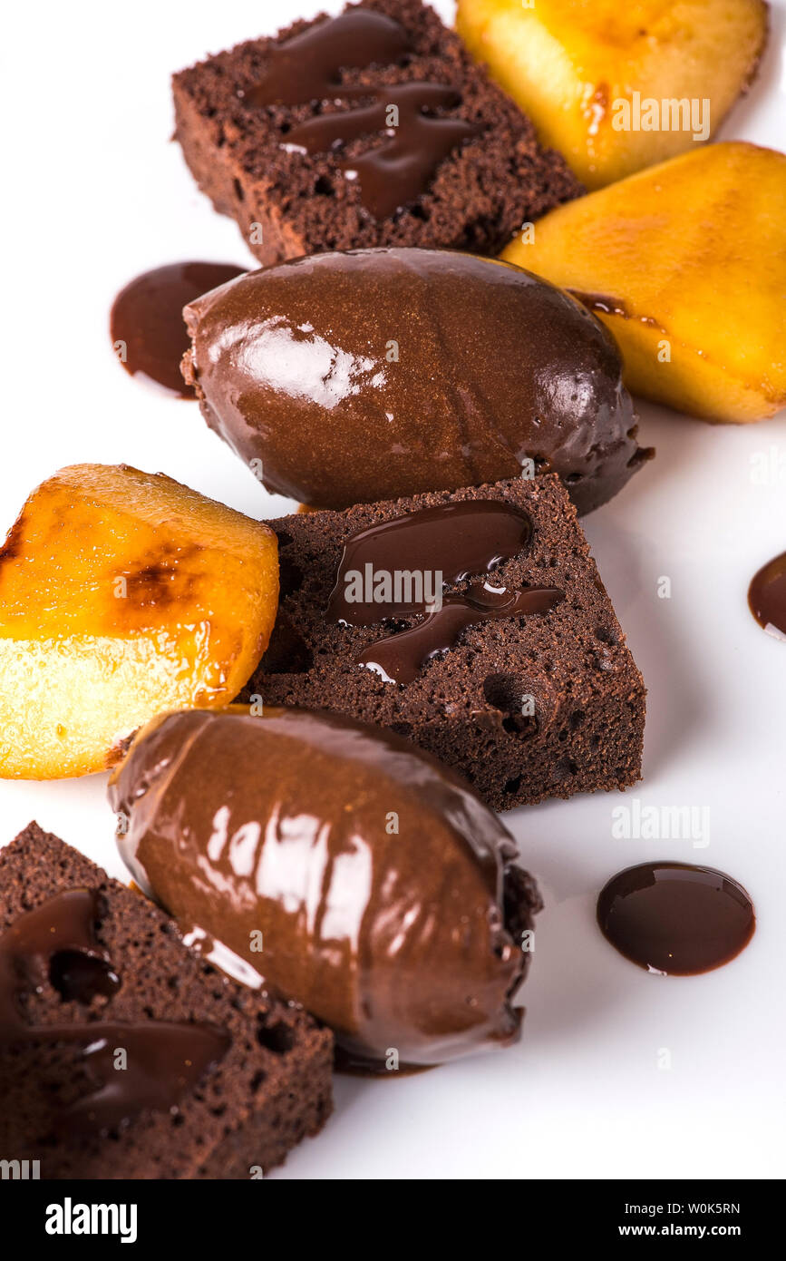 chocolate ganache, roasted pears and chocolate sponge Stock Photo - Alamy