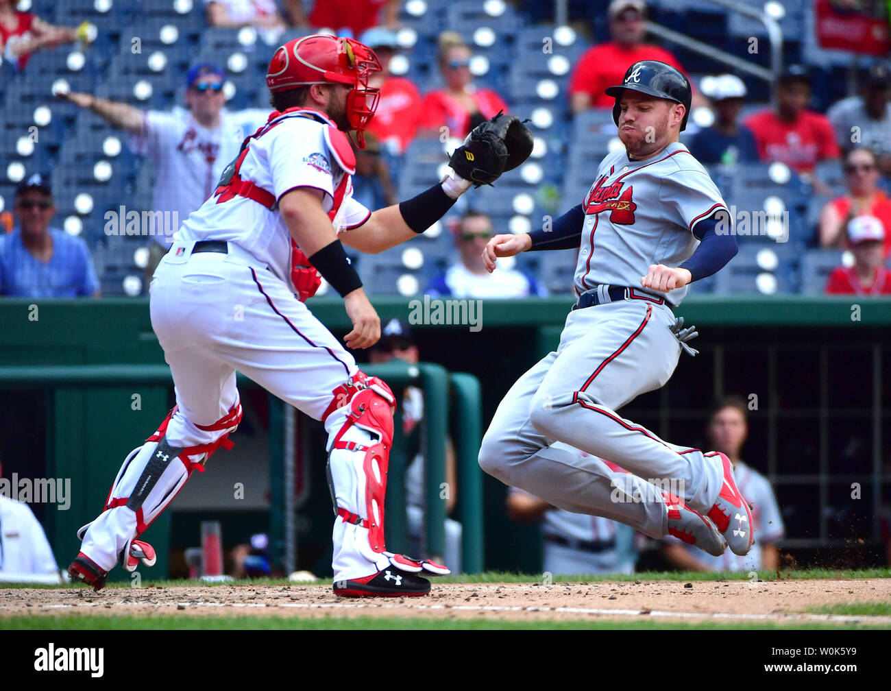 Atlanta Braves first baseman Freddie Freeman (5) scores against ...