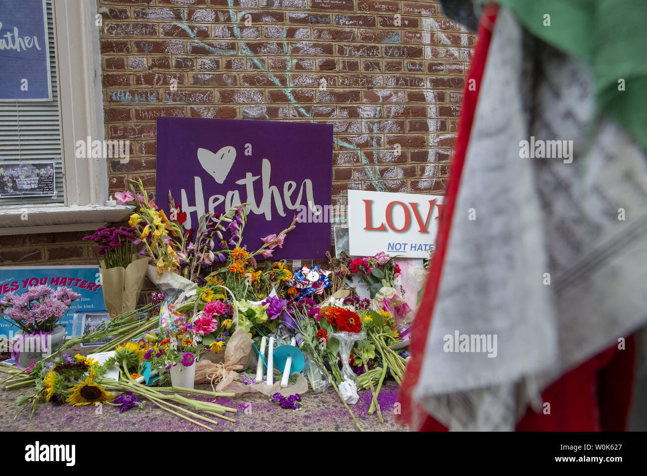 A memorial for Heather Hayer marks the spot where she was struck by a ...