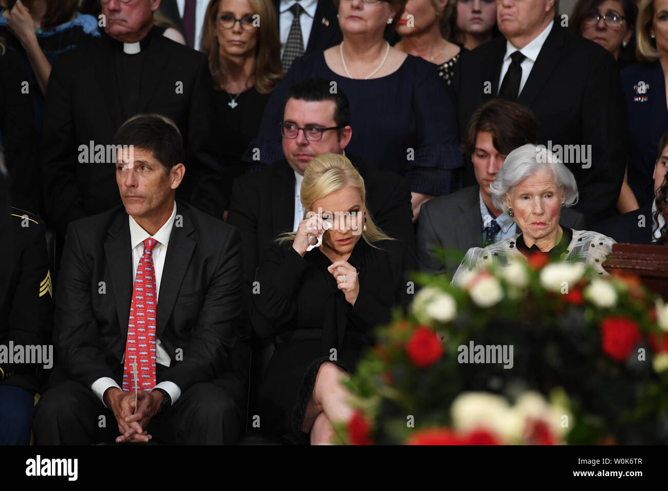 Daughter Meghan McCain and mother Roberta McCain listen during the ...