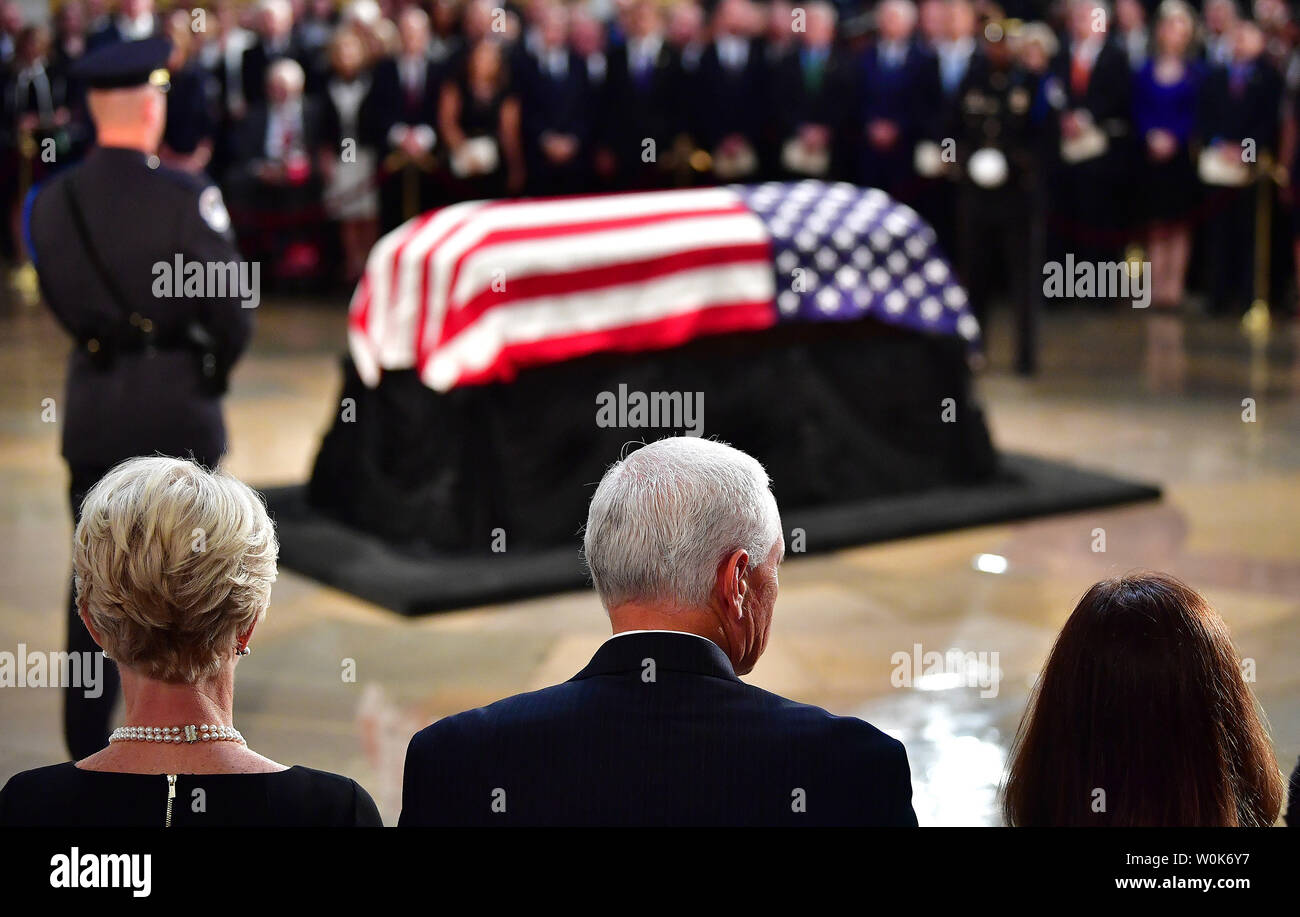 Vice President Mike Pence (C) his wife Karen (R) and City McCain, the ...