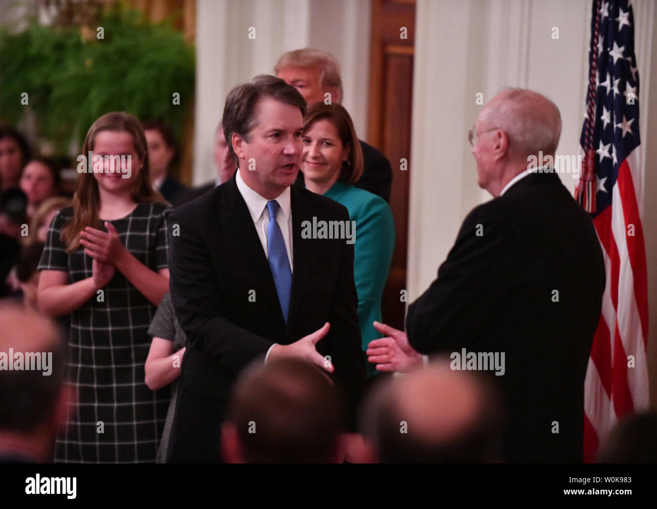 Supreme Court Associate Justice Brett Kavanaugh shakes hands with ...