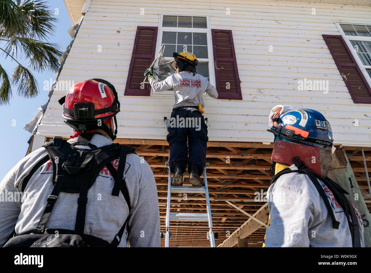 South Florida Task Force Two Search and Rescue Team members break into ...