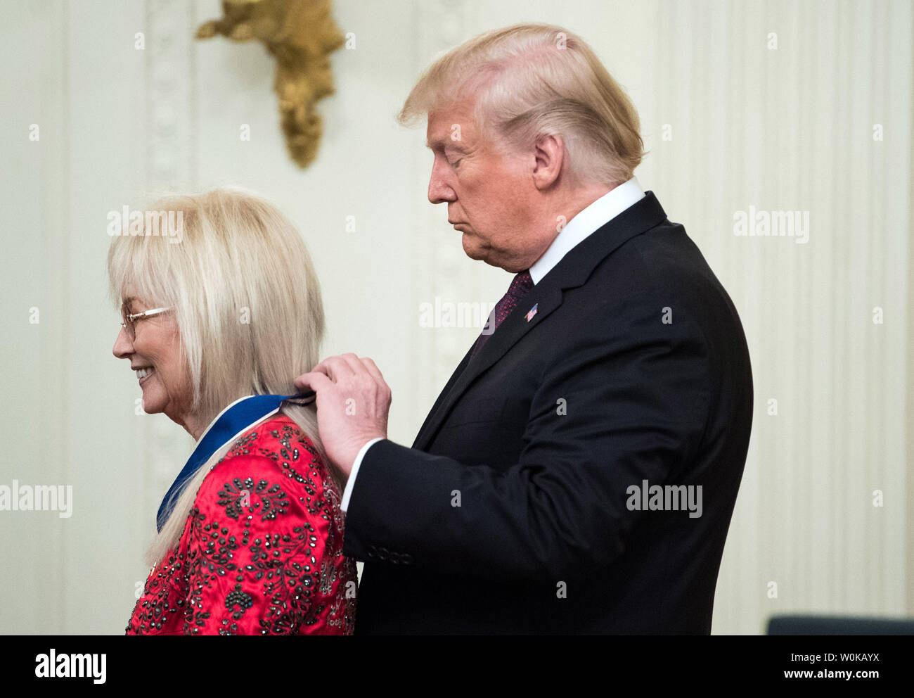 President Donald Trump awards the Medal of Freedom to Miriam Adelson, a ...