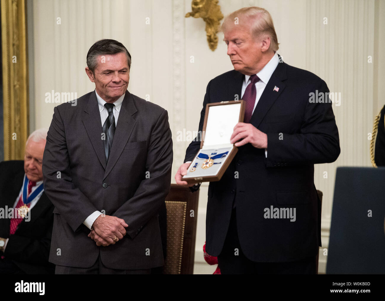 President Donald Trump presents the Medal of Freedom for the late ...