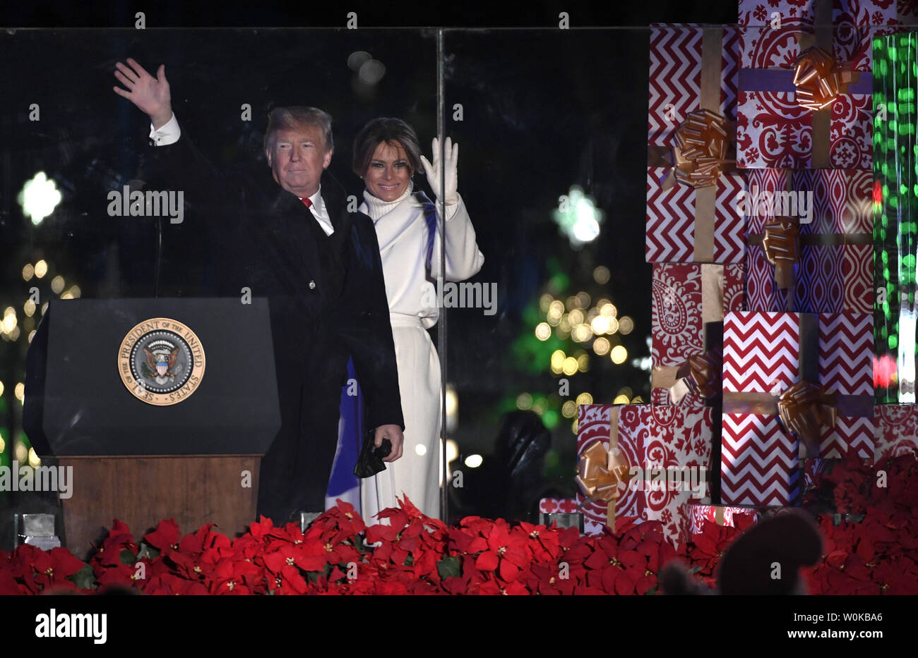 President Donald Trump and First Lady Melania Trump wave goodbye after ...