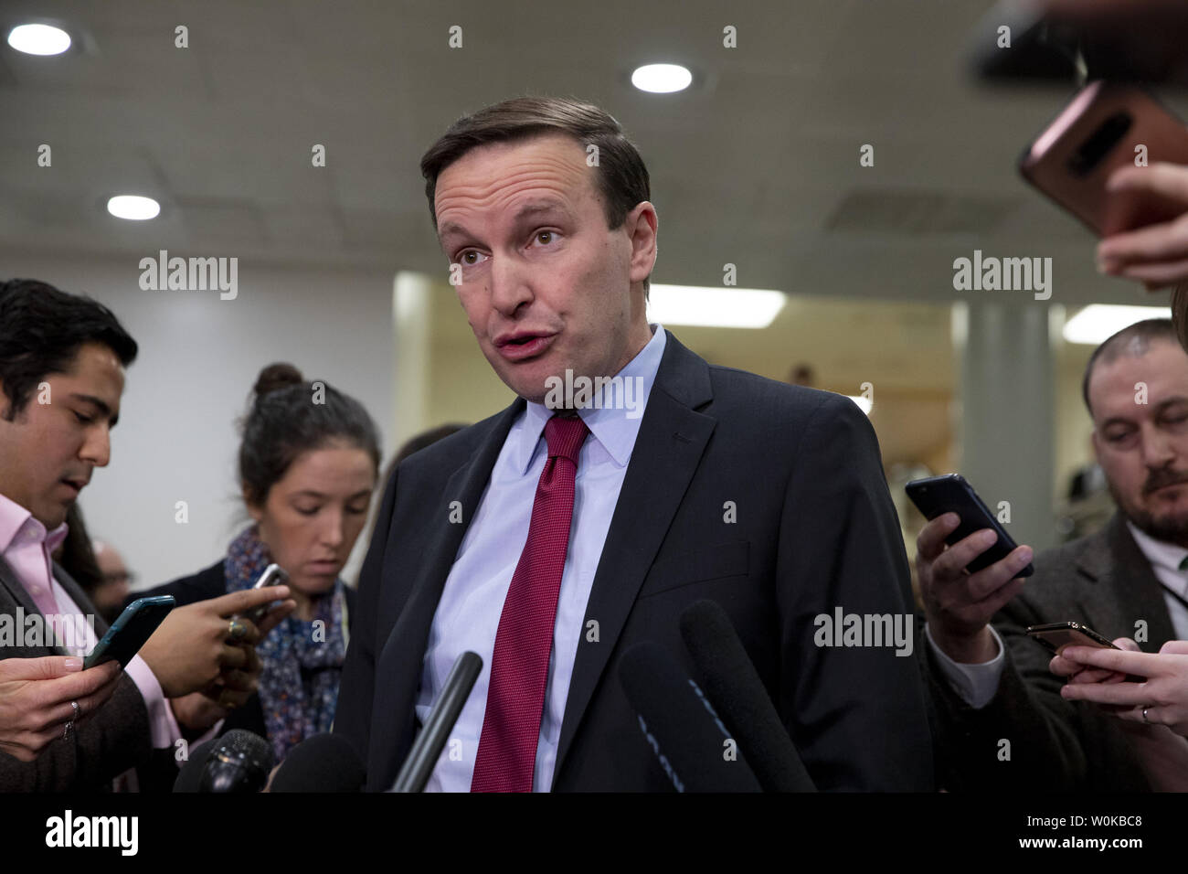 Sen. Chris Murphy, D-CT, speaks to reporters after a all Senators ...