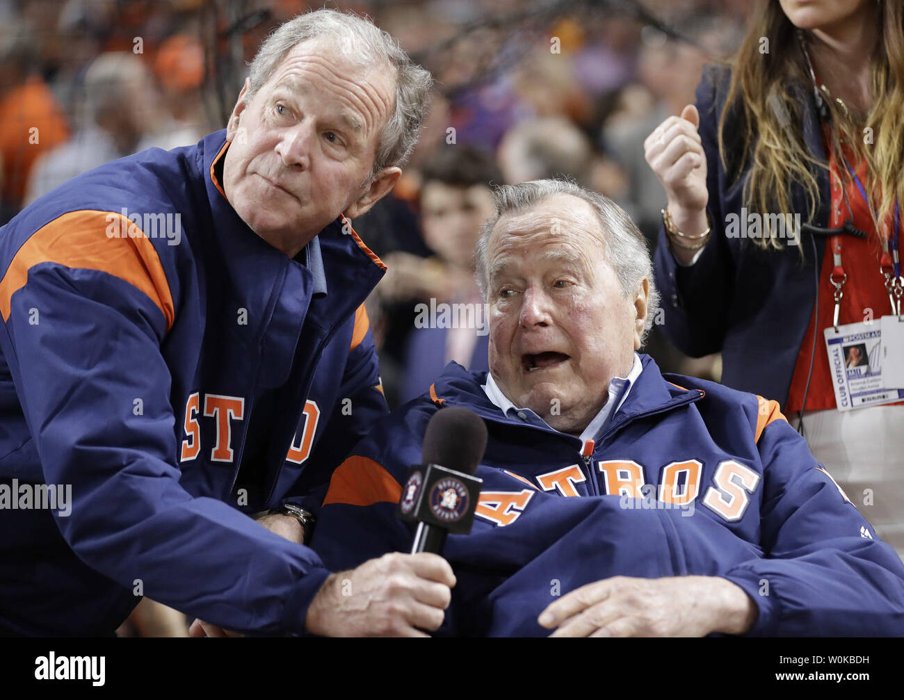 In this file photo, former President George W. Bush and his father ...