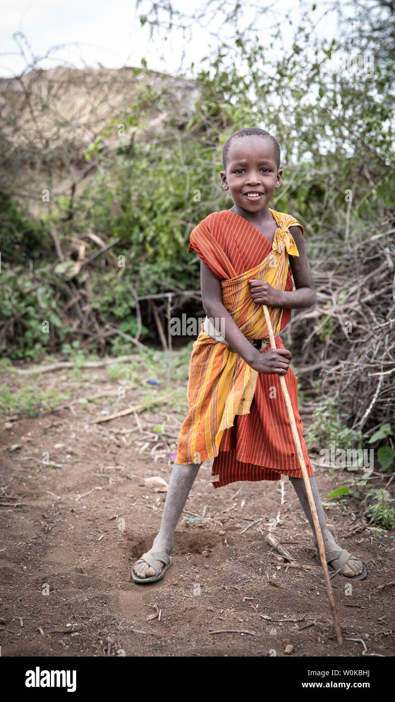 same, Tanzania, 5th June 2019: young maasai boy in traditional outfit ...