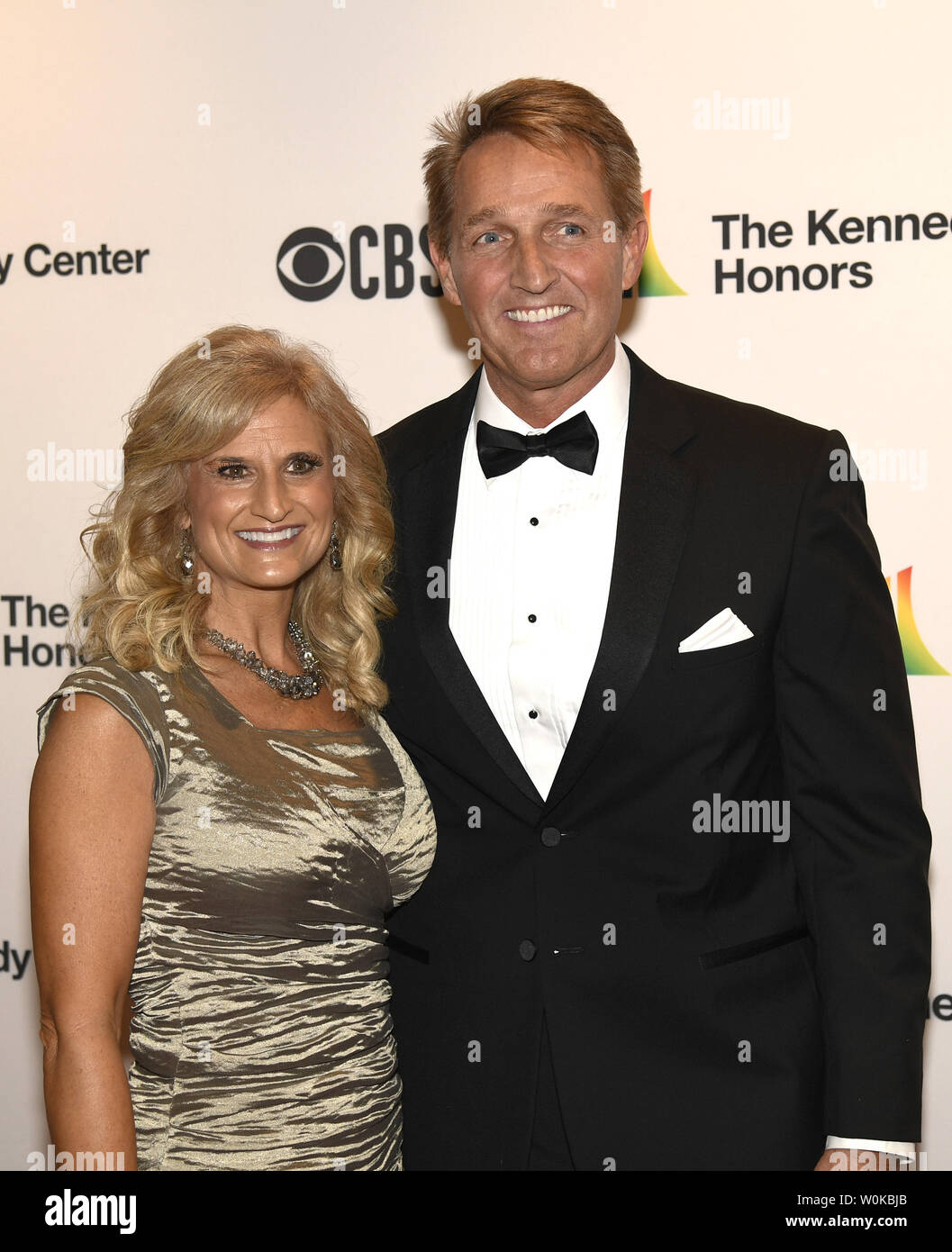 Sen. Jeff Flake of Arizona and his wife Cheryl pose for photographers ...