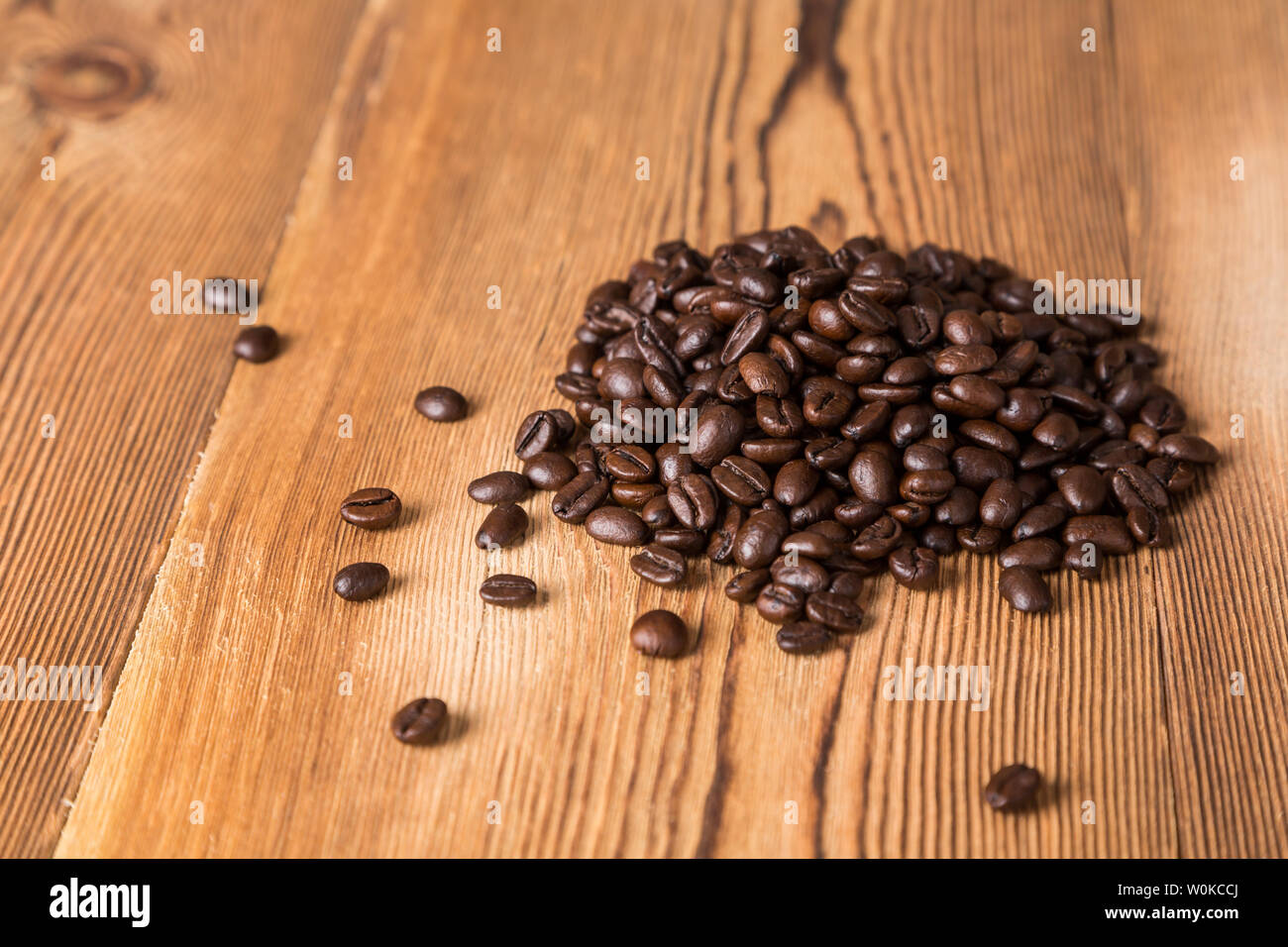 Coffee beans on the table Stock Photo - Alamy