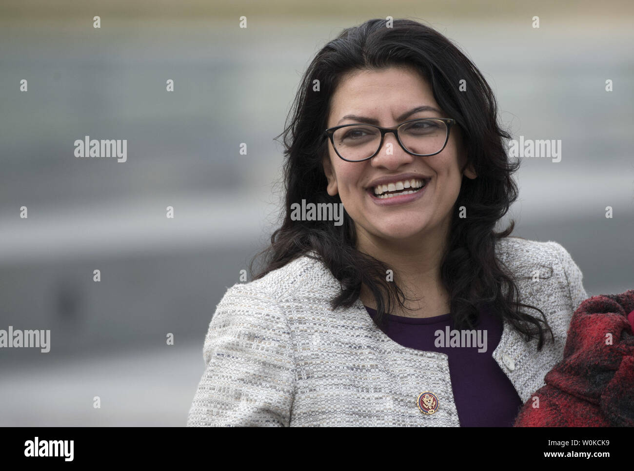 Rep. Rashida Tlaib, D-MI, attends a group photo of all the female House ...