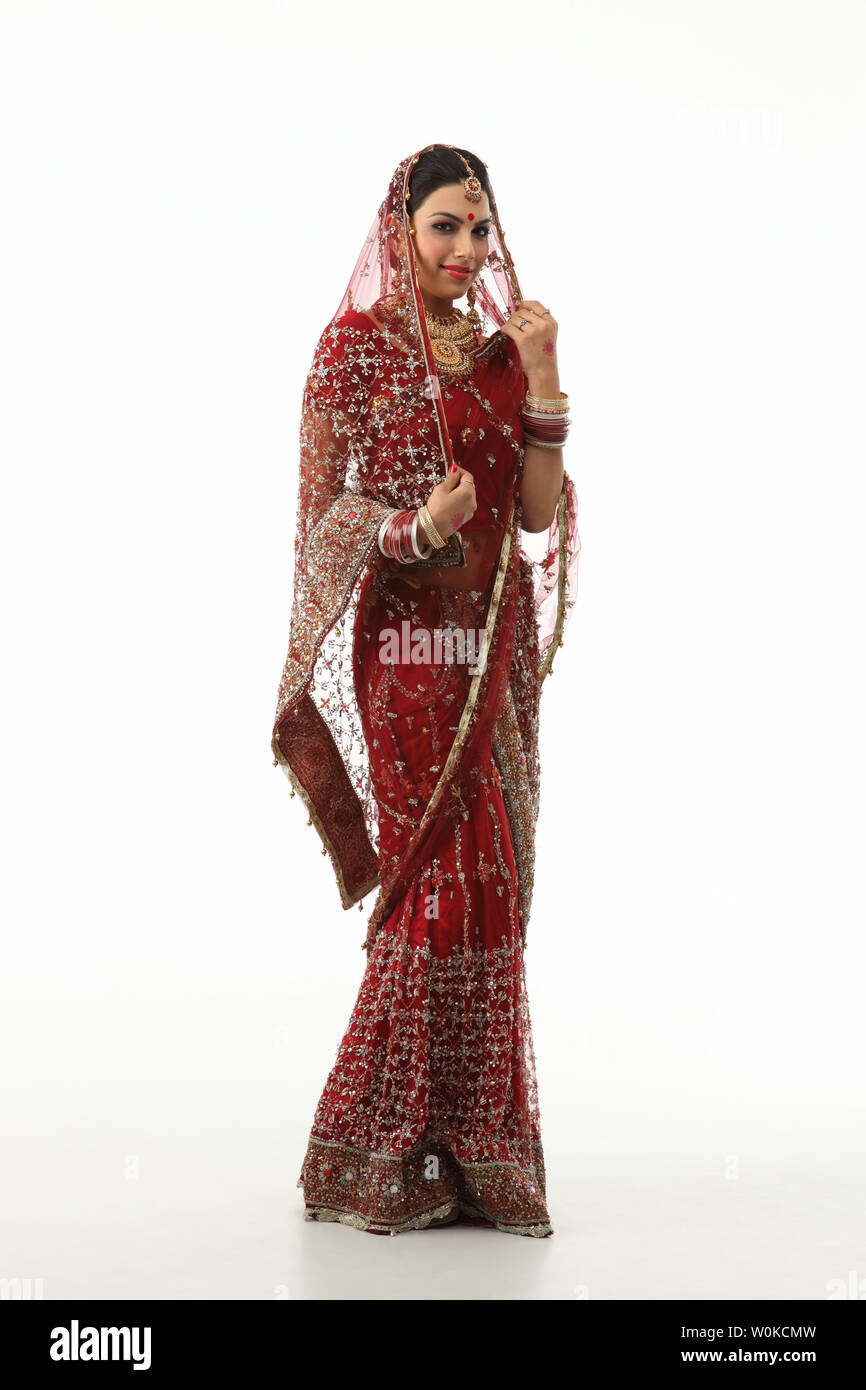 Indian bride standing Stock Photo - Alamy