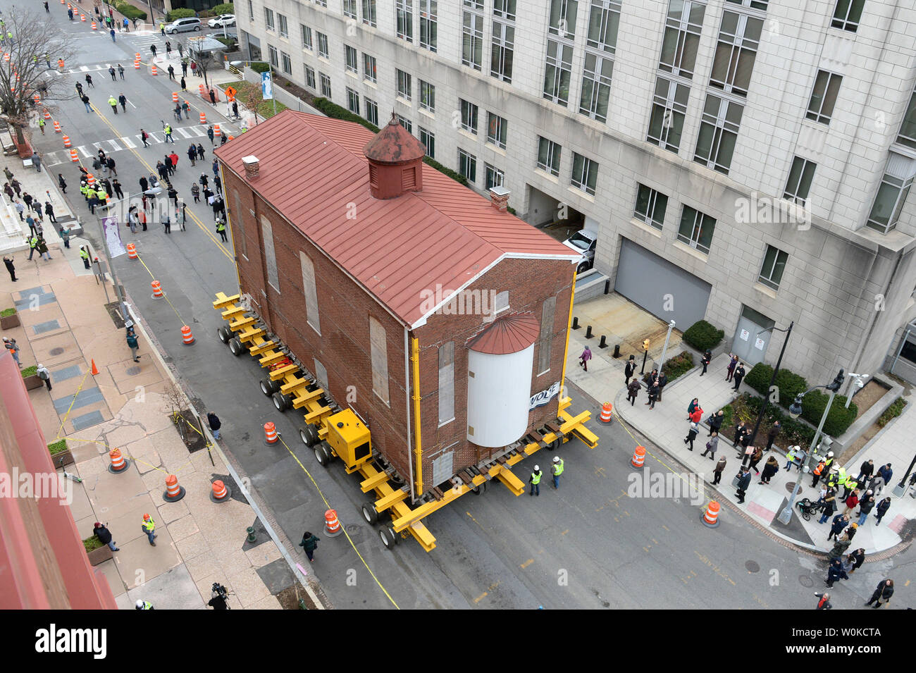 Workers move Adas Israel synagogue one block south to its new location ...