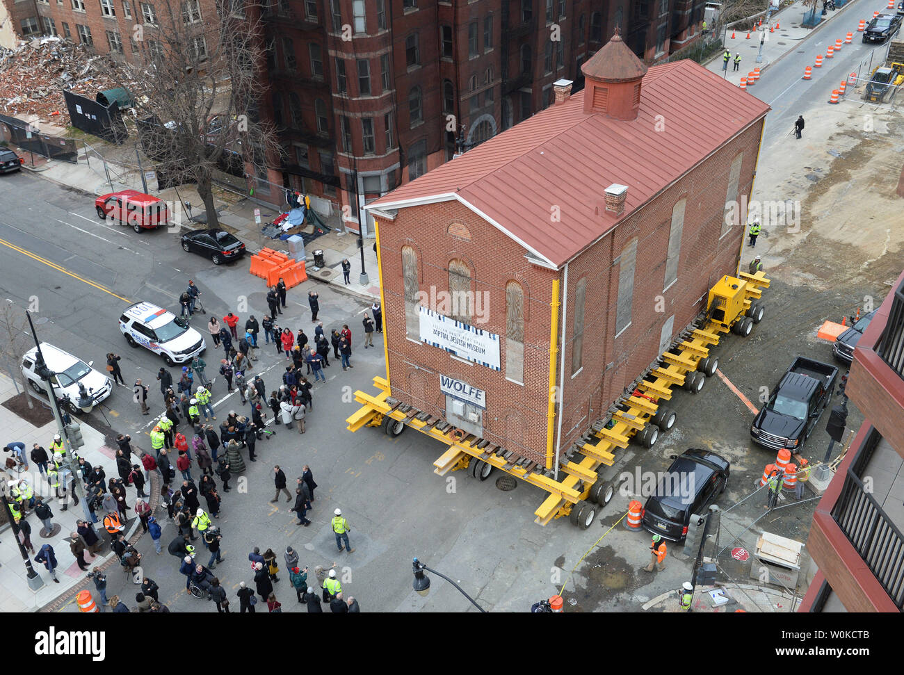 Workers move Adas Israel synagogue one block south to its new location ...