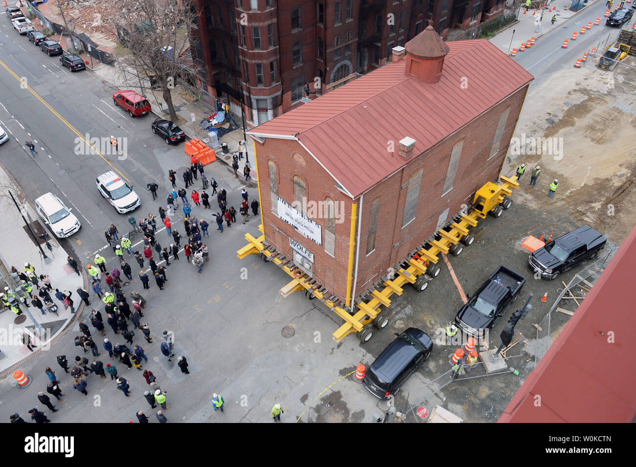 Workers move Adas Israel synagogue one block south to its new location ...