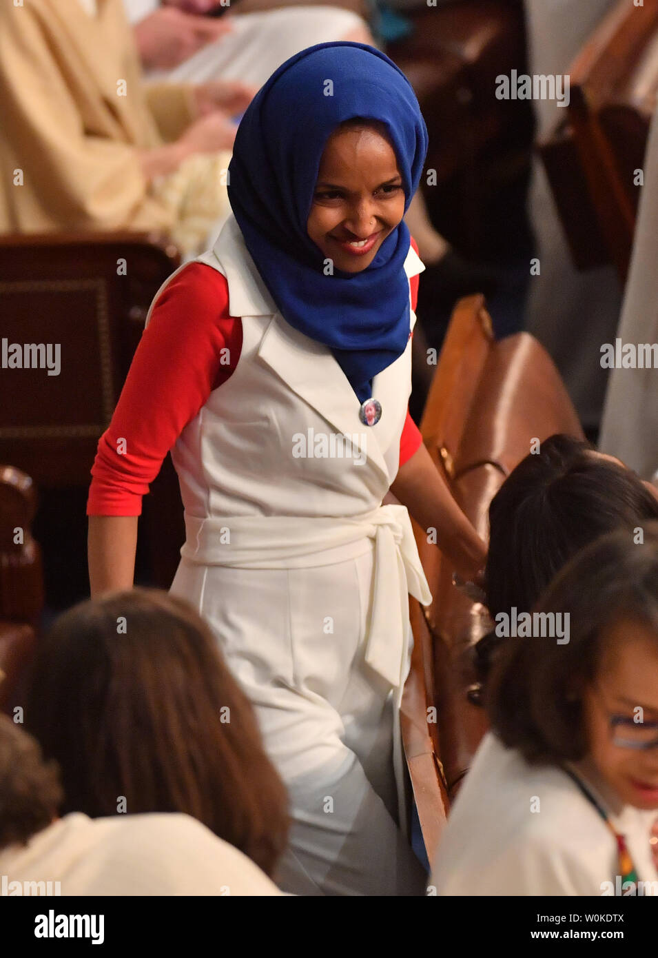 Rep. Ilhan Omar (D-MN), wearing white in honor of women's suffrage ...