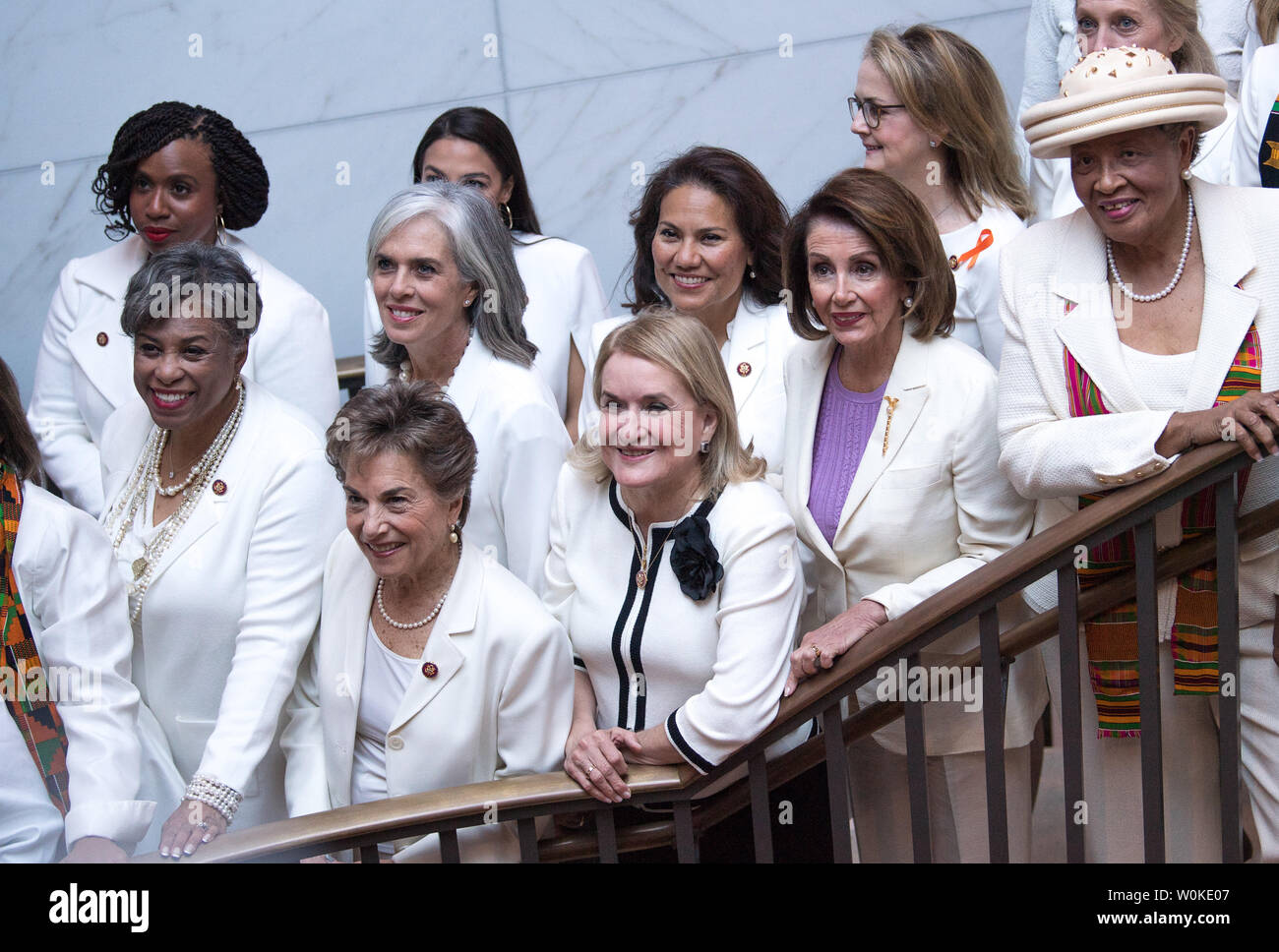Women House Democrats wearing white in honor of women suffrage pose for ...