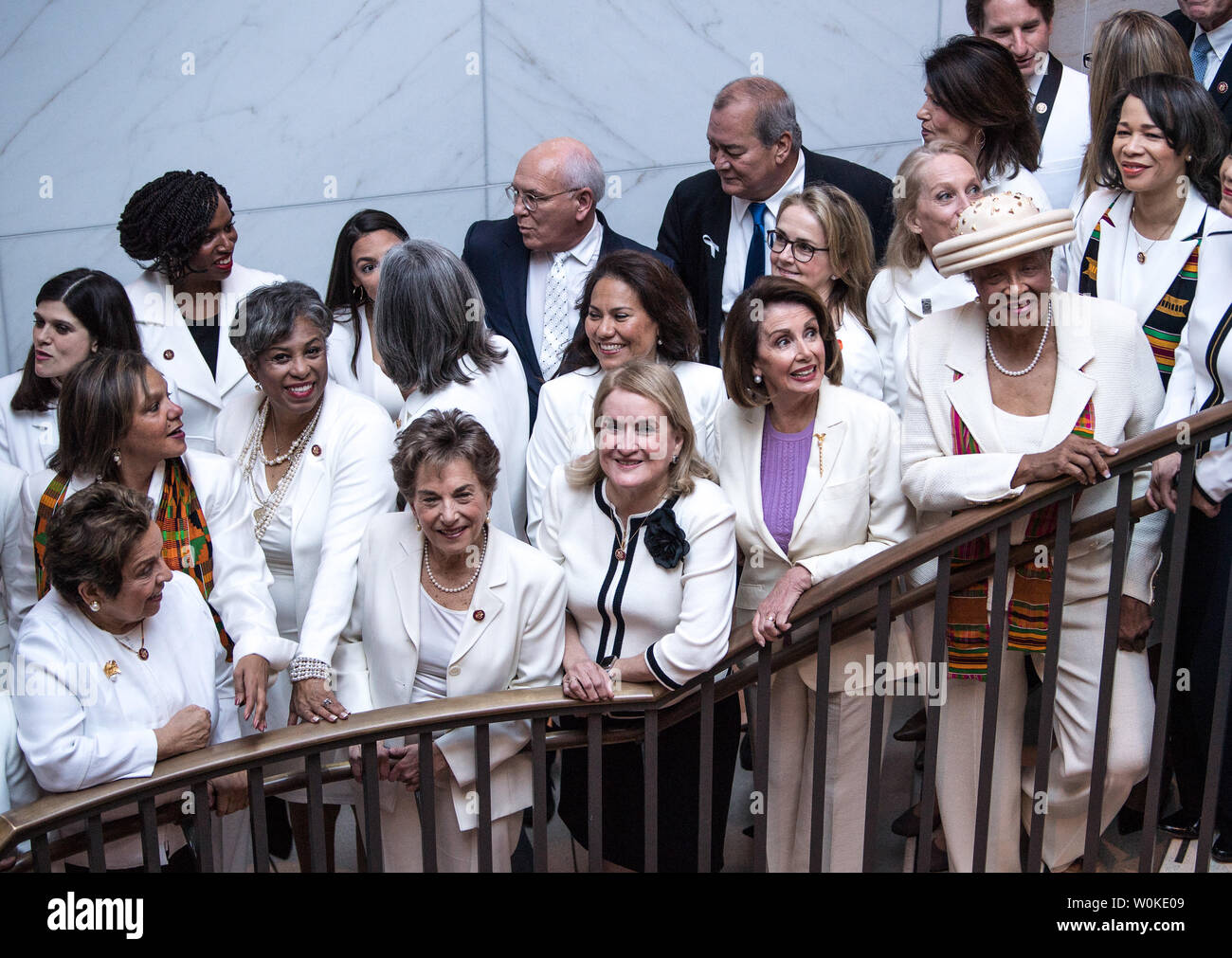 Women House Democrats wearing white in honor of women suffrage pose for ...