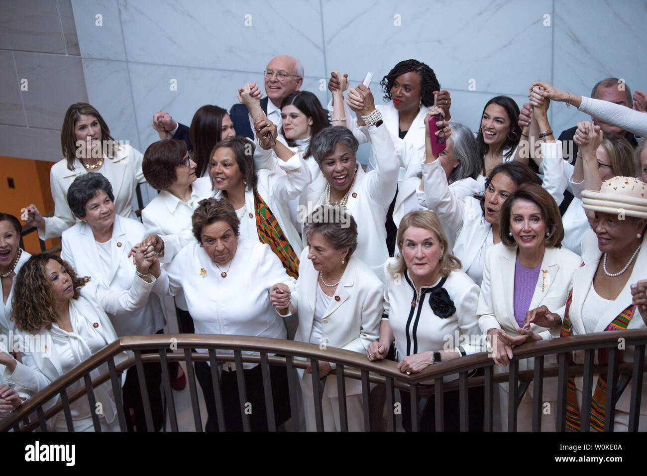 Women House Democrats wearing white in honor of women suffrage pose for ...