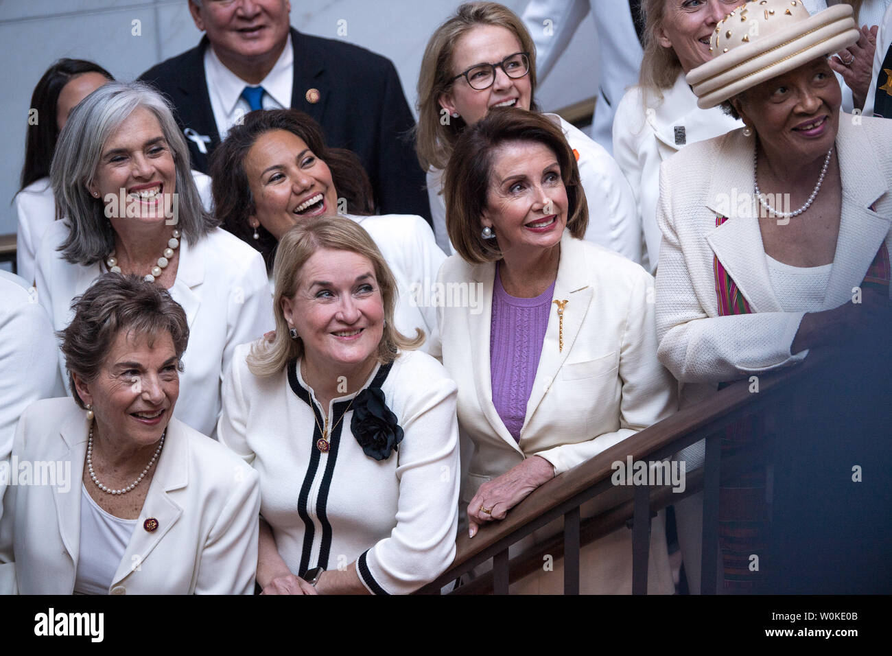 Women House Democrats wearing white in honor of women suffrage pose for ...