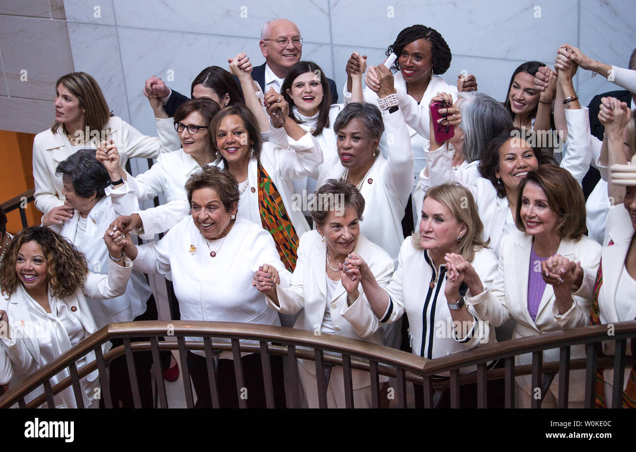Women House Democrats wearing white in honor of women suffrage pose for ...