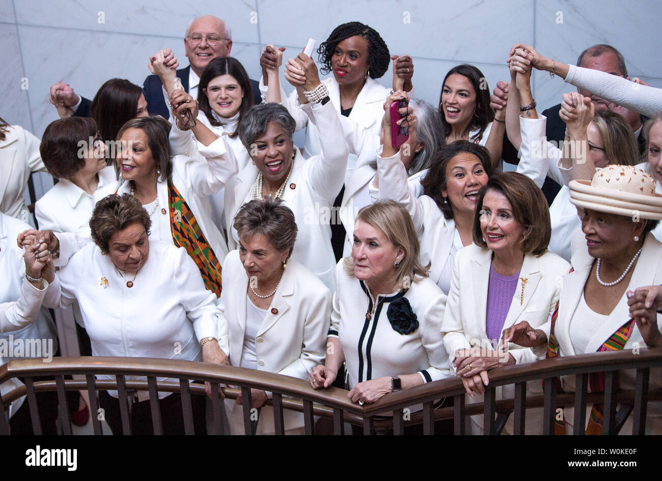 Women House Democrats wearing white in honor of women suffrage pose for ...