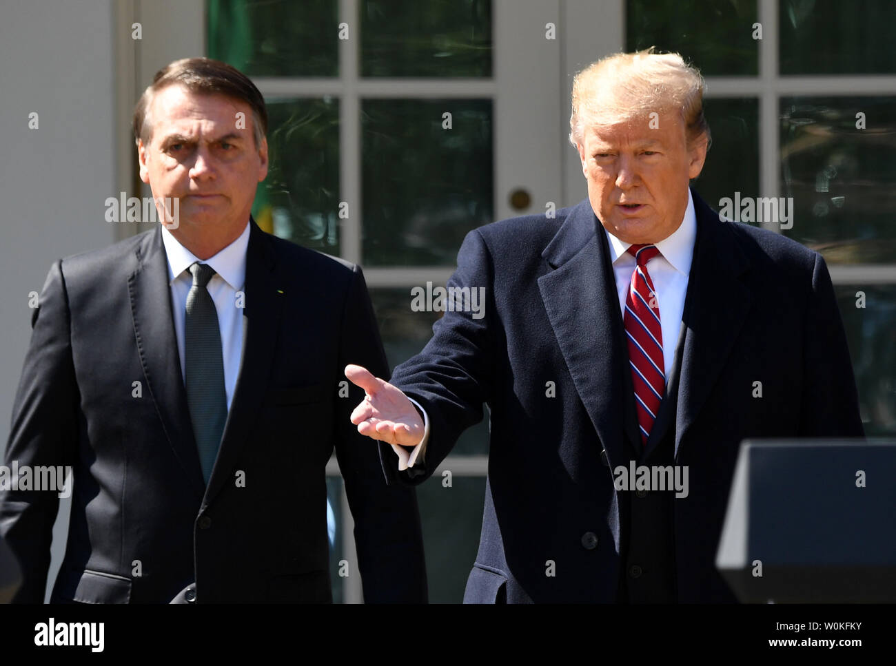President Donald Trump arrives with Brazilian President Jair Bolsonaro ...