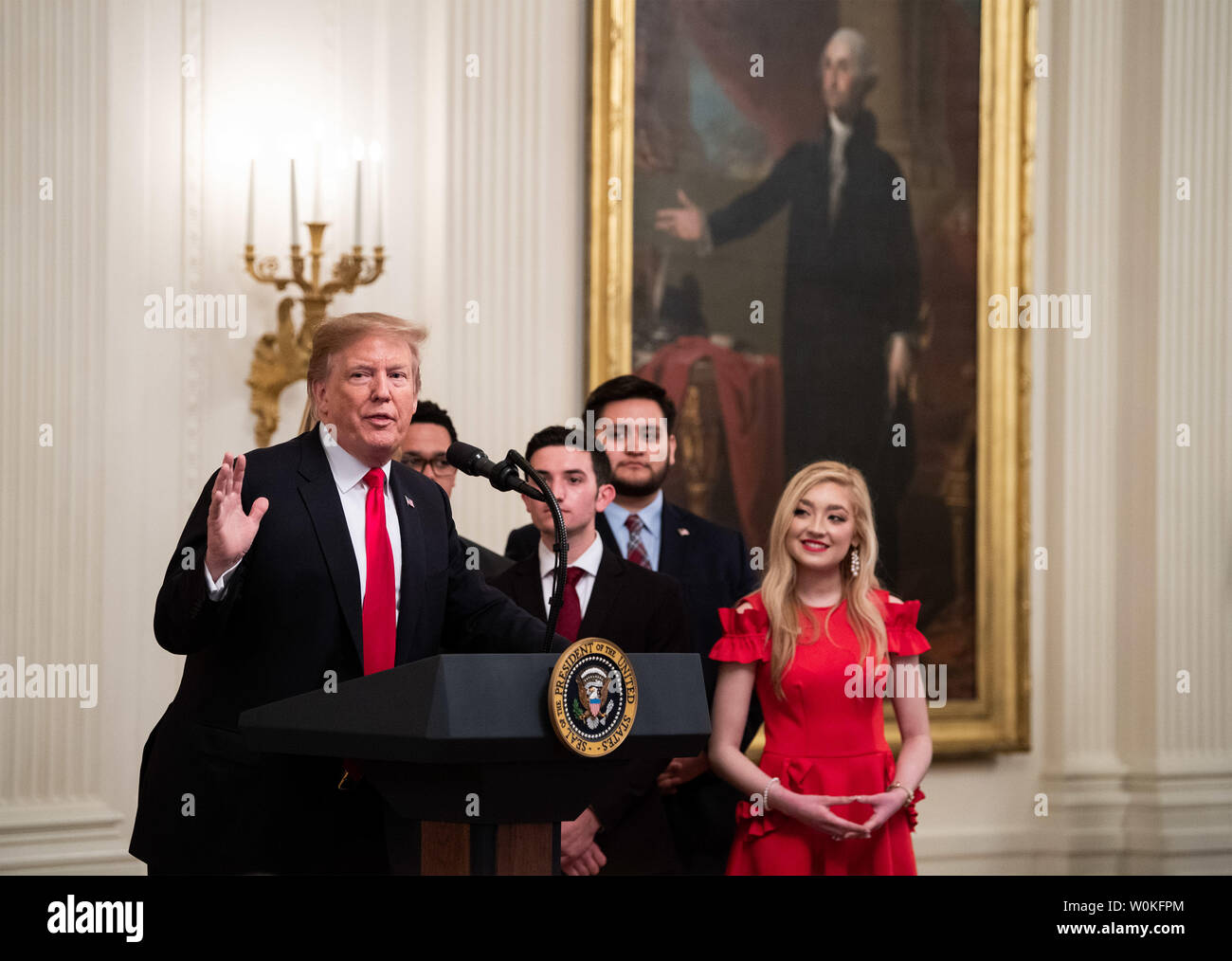 President Donald Trump is joined by college students as he delivers ...