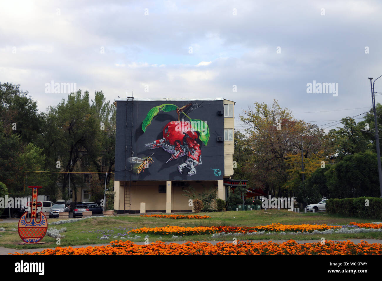 Apple mural on one of the buildings Stock Photo - Alamy