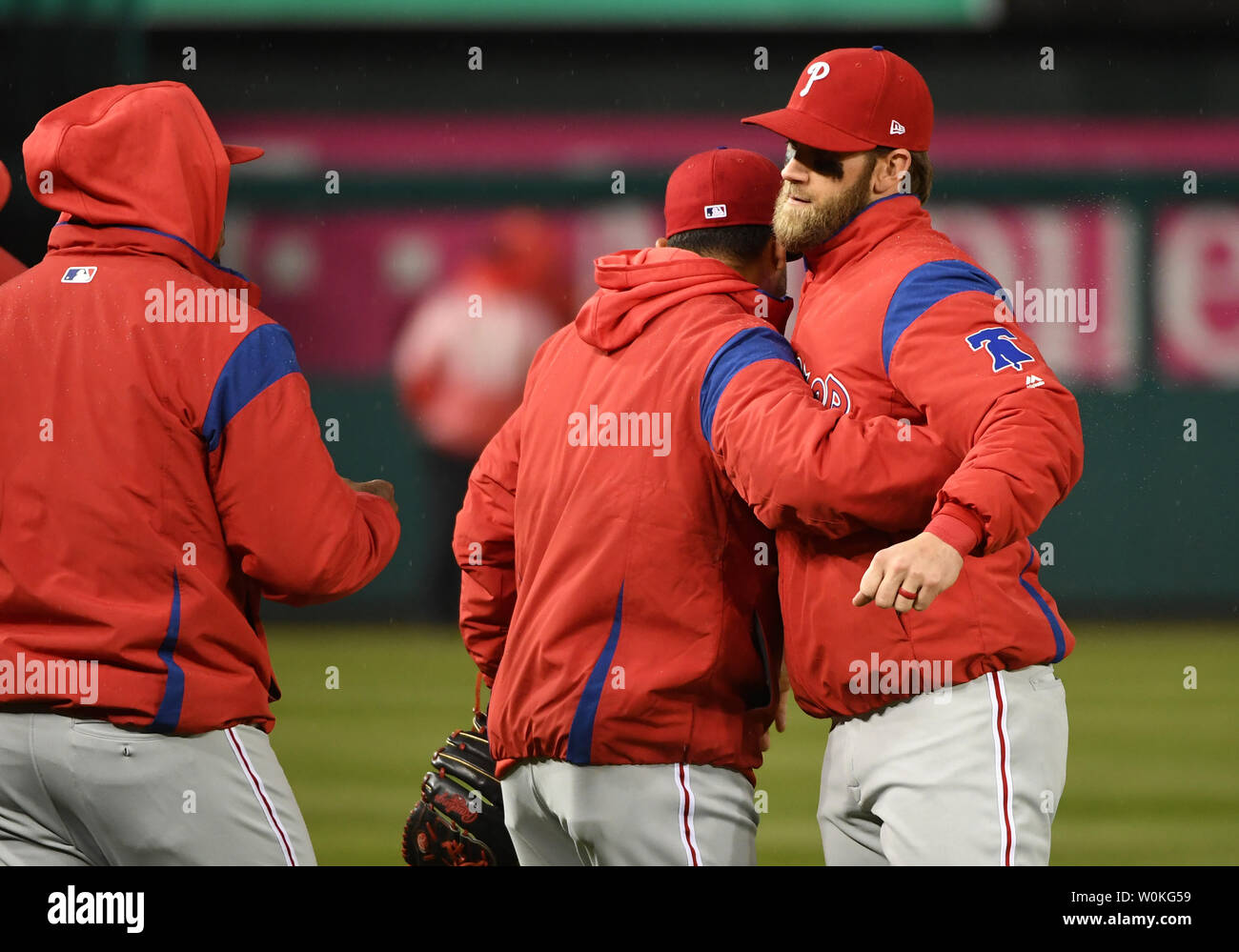 Philadelphia Phillies right fielder Bryce Harper hugs teammates before ...