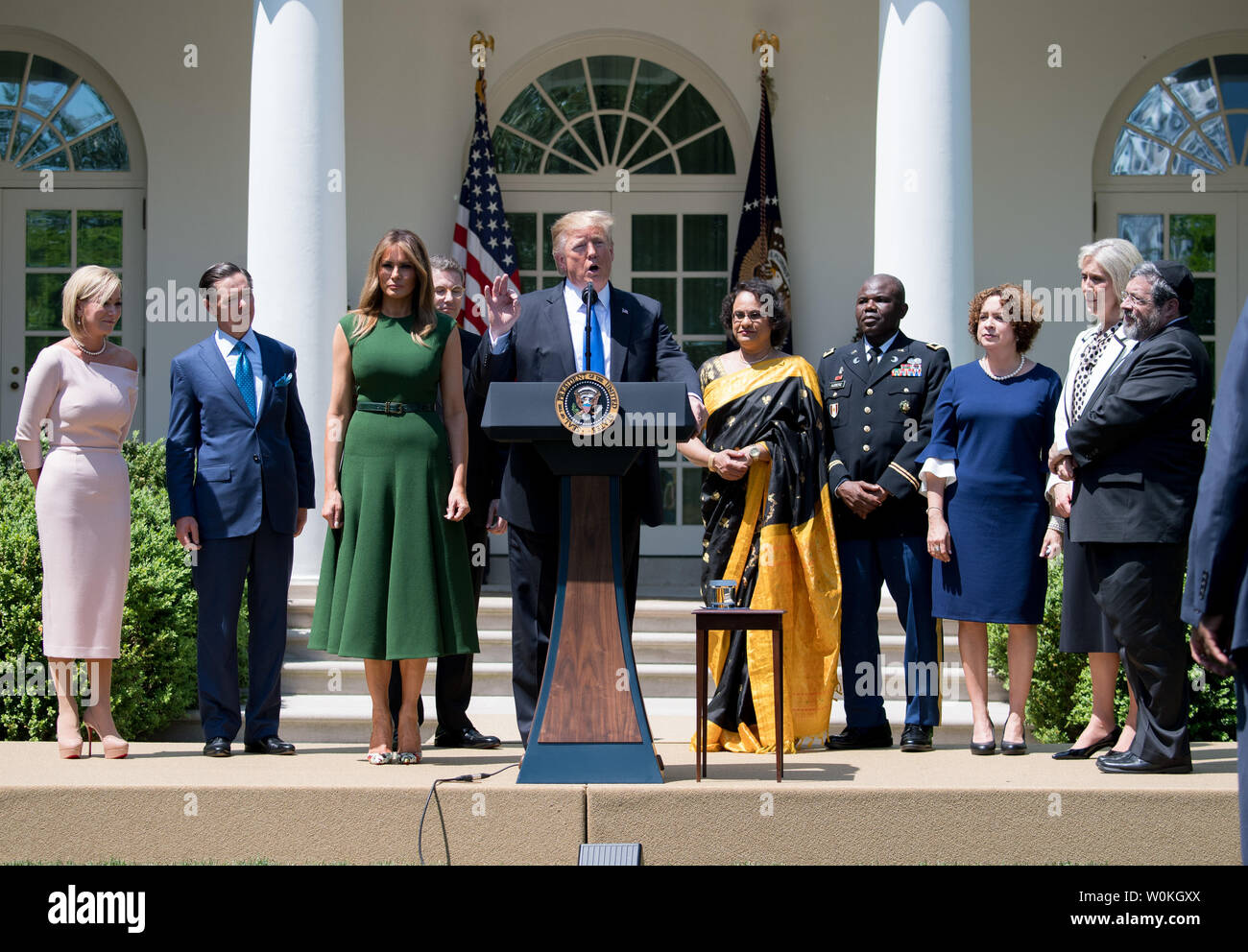 President Donald Trump speaks on stage as he is joined by religious ...