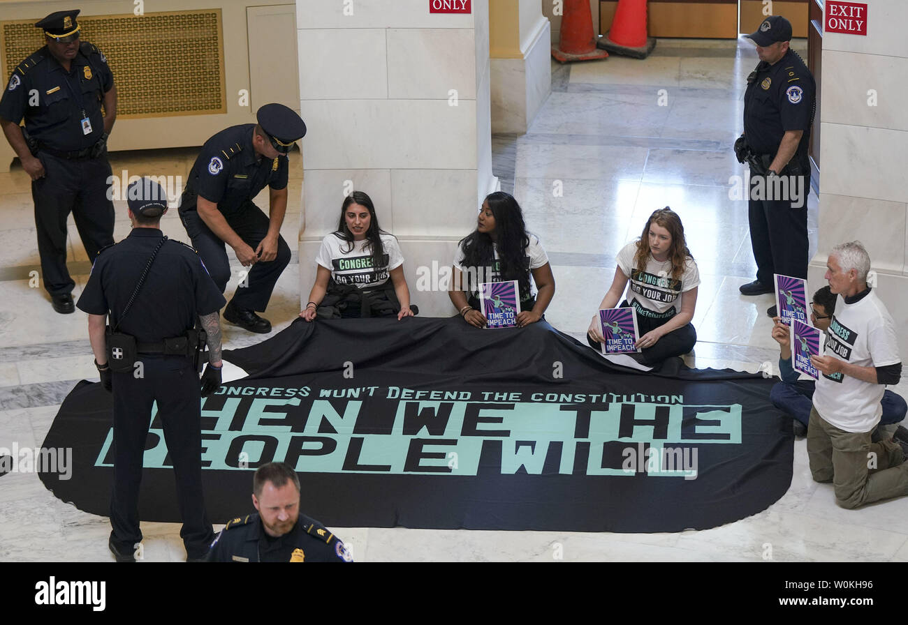 Demonstrators from By the People protest in the Cannon House Office ...
