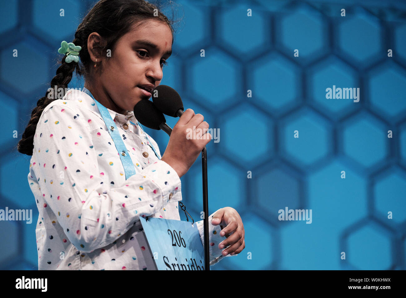 Srinidhi Rao, 9, of Hinsdale, Illinois, participates in the third round ...
