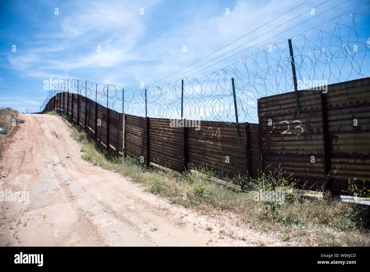 A section of border fence on the U.S. - Mexico border is seen in Tecate ...