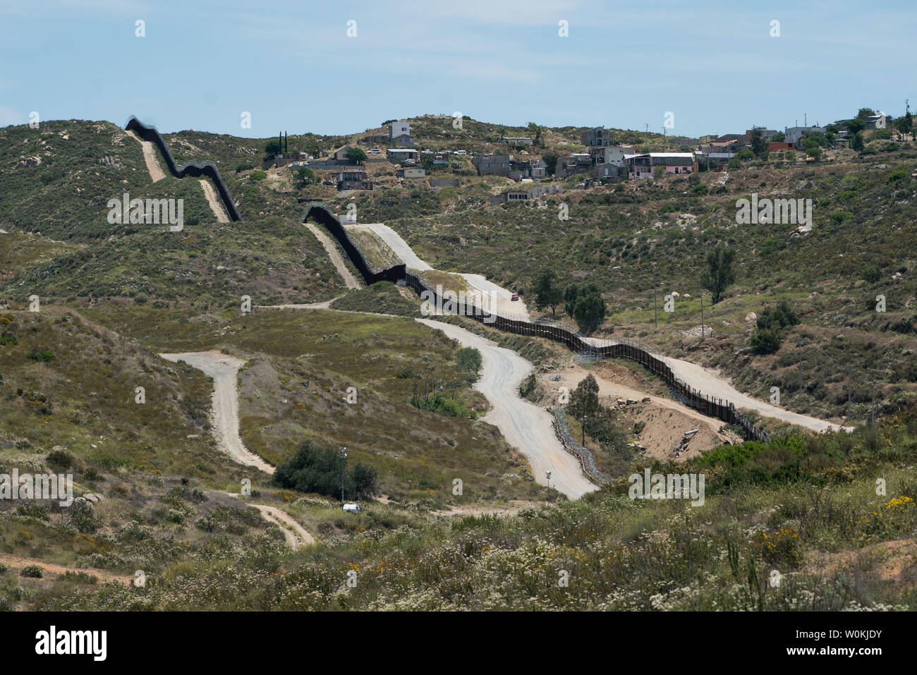 A section of border fence on the U.S. - Mexico border is seen in Tecate ...