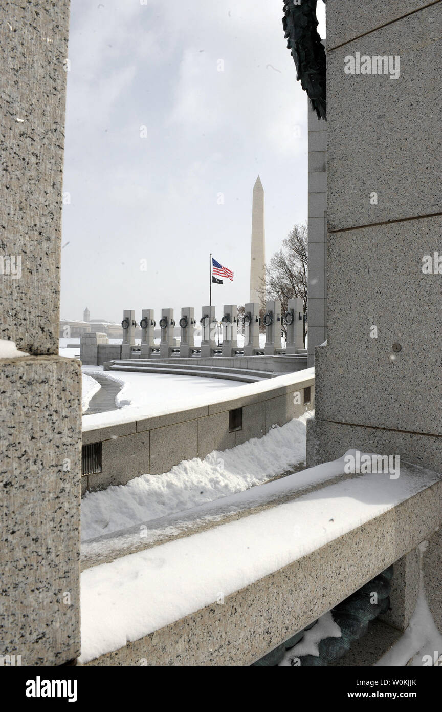 Snow covers the National Mall as the Washington Monument is seen from ...