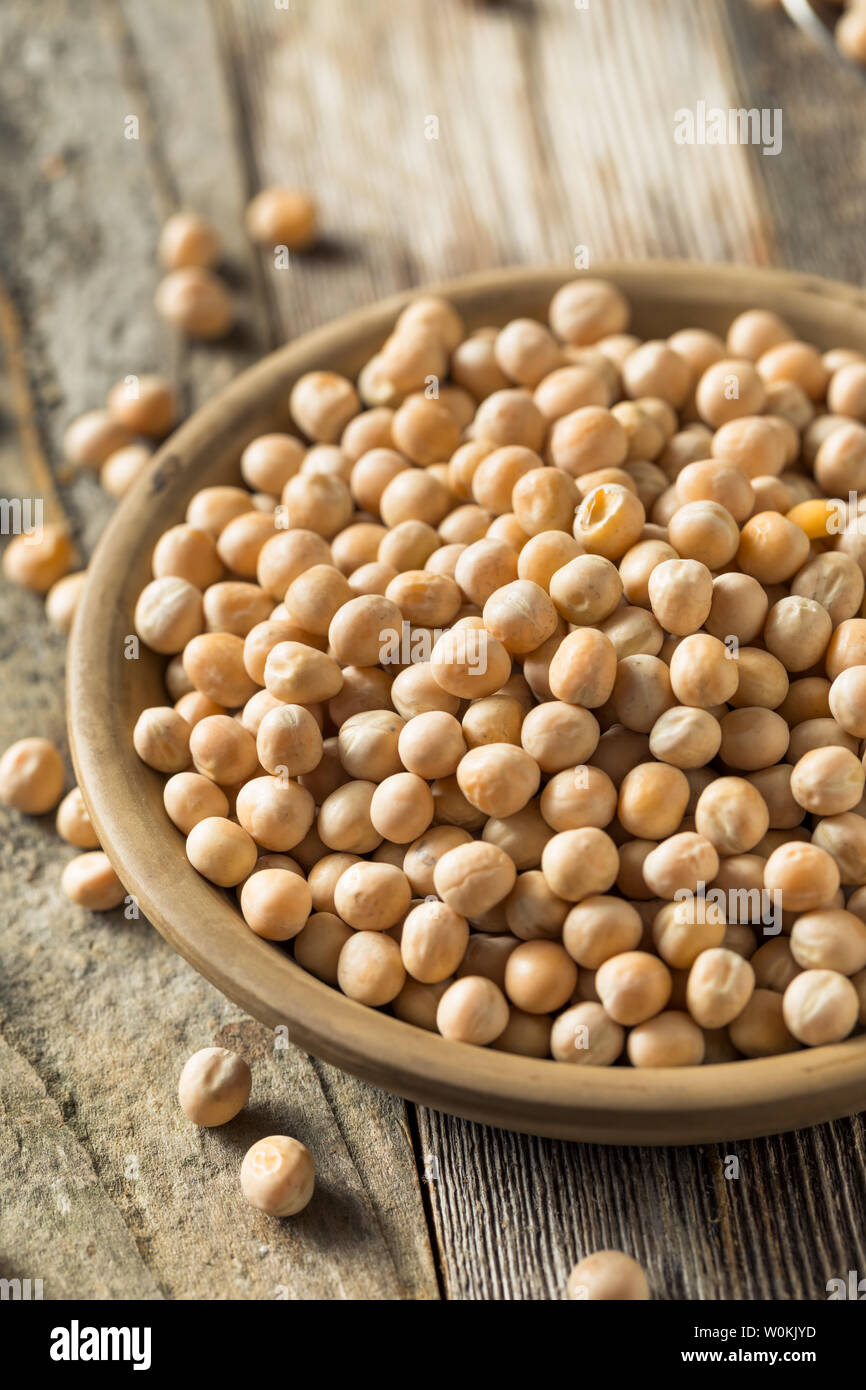 Organic Dried Yellow Peas in a Bowl Stock Photo - Alamy