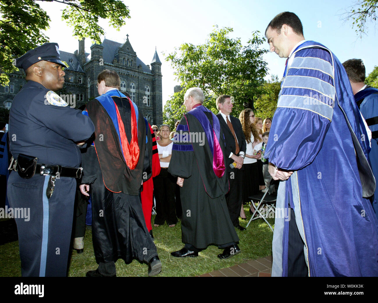 Spanish Crown Prince Felipe (L) walks to a Walsh School of Foreign ...