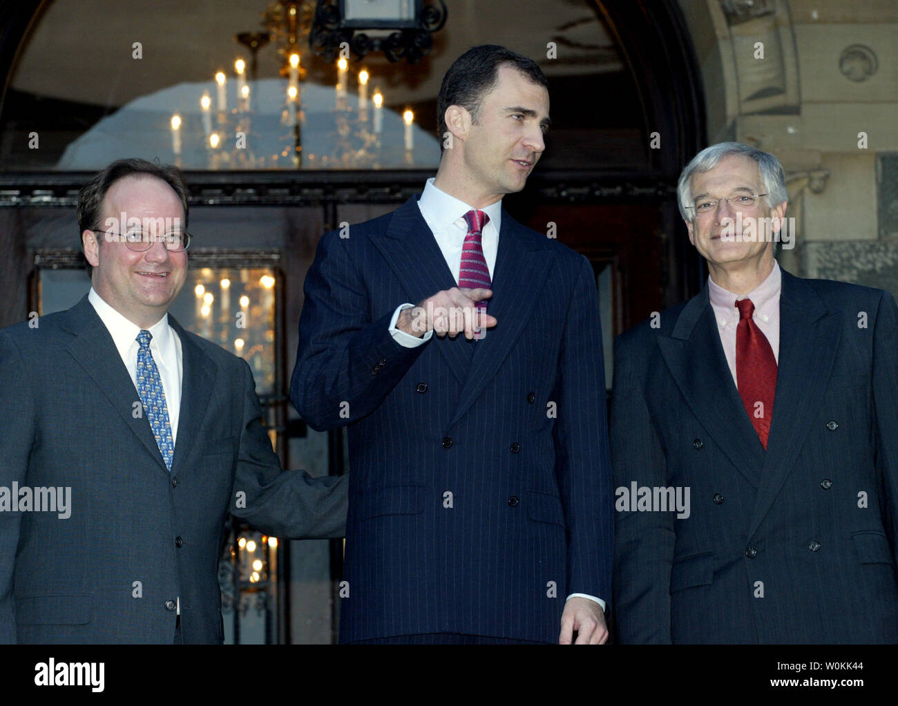 Spanish Crown Prince Felipe (C) gestures with John DeGioia, President ...