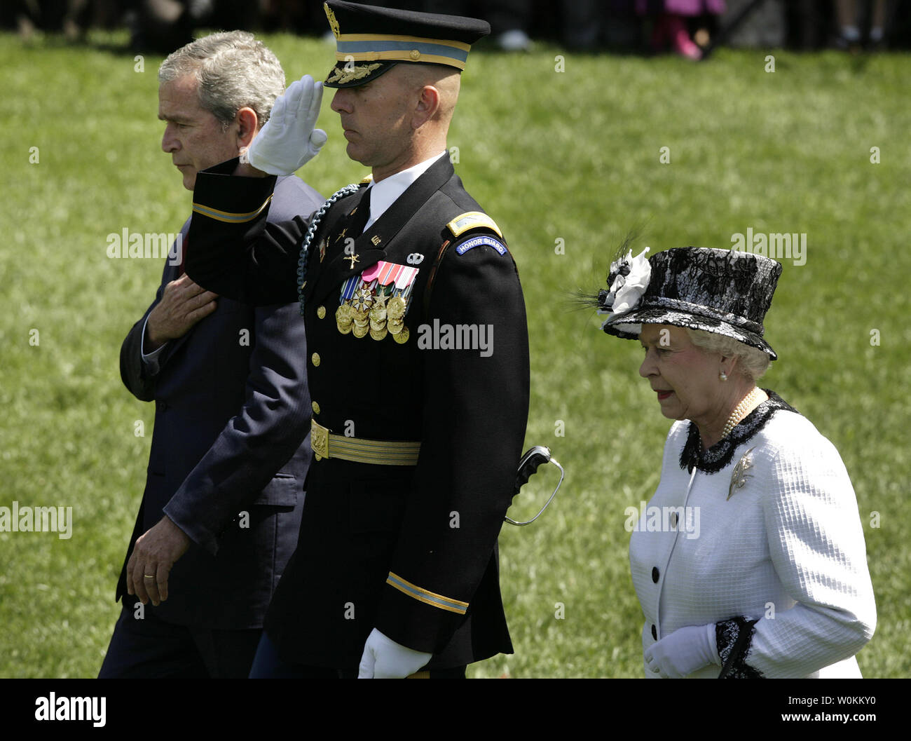 U.S. President George W. Bush and Britian's Queen Elizabeth II inspect ...