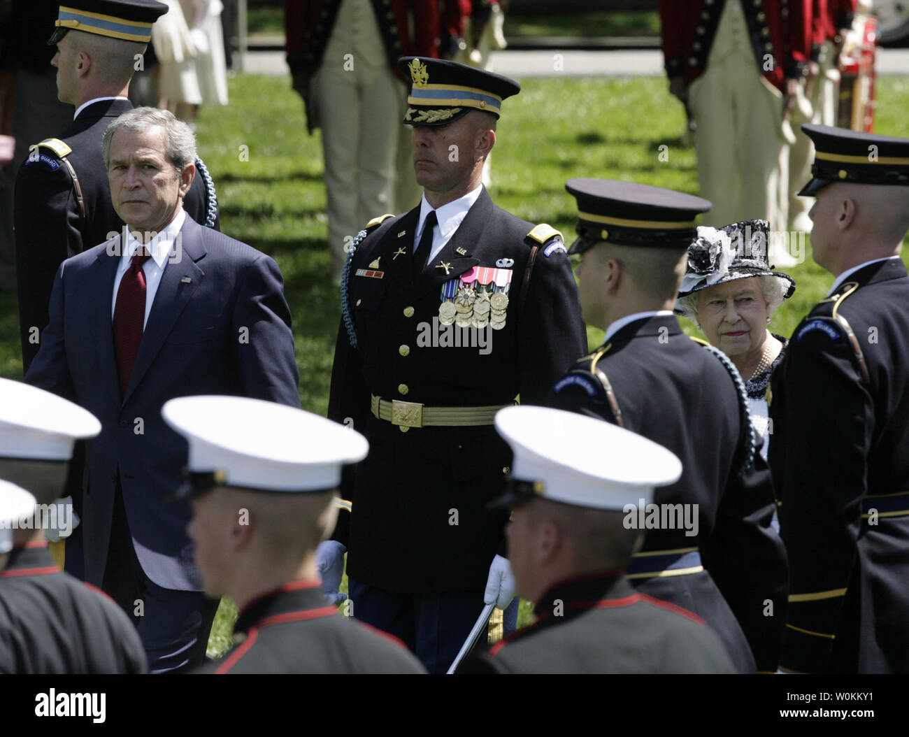 U.S. President George W. Bush and Britain's Queen Elizabeth II inspect ...