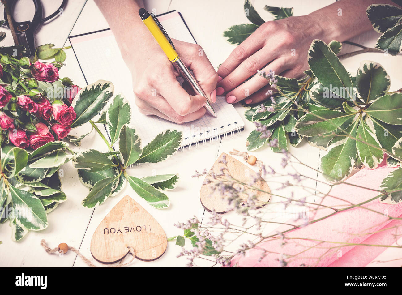 Womens hands writing hi-res stock photography and images - Alamy