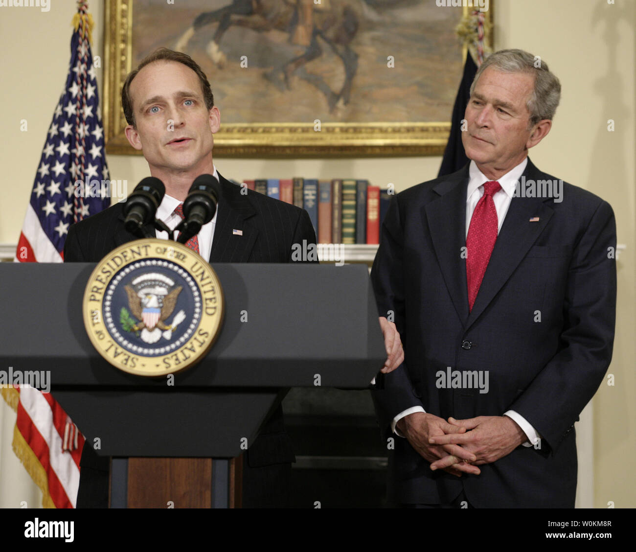 U.S. President George W. Bush (R) listens to his nominee for Secretary ...