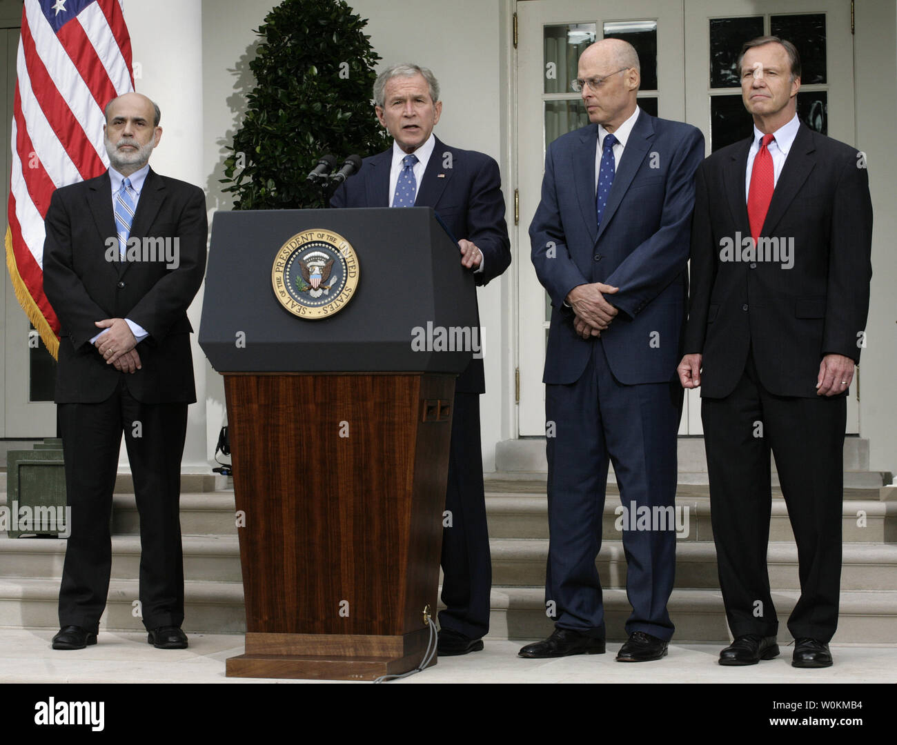 U.S. President George W. Bush (2nd L) speaks about the economy in the ...