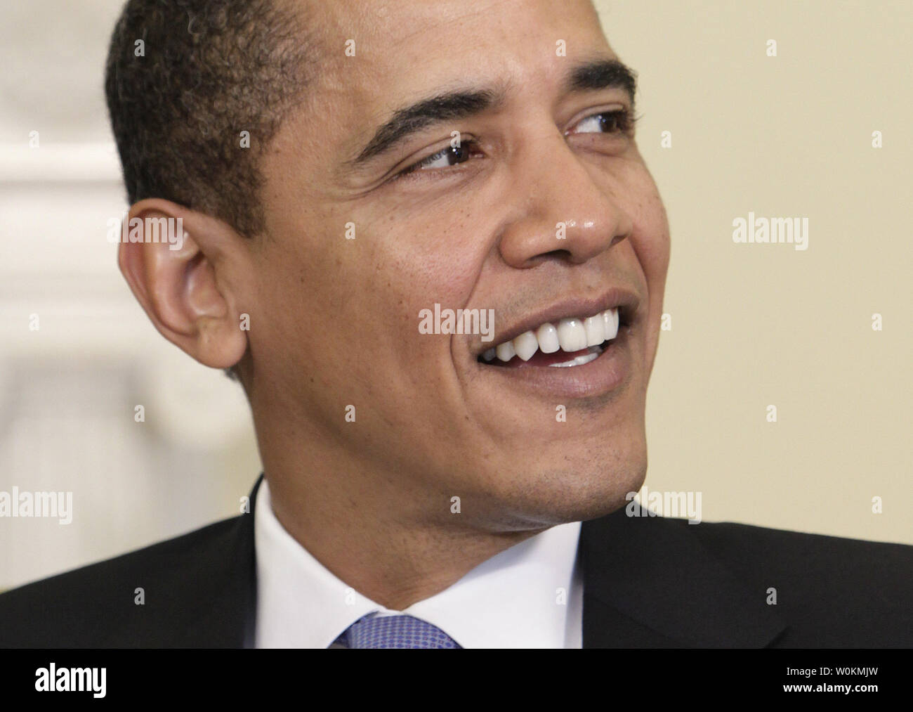 U.S. President Barack Obama smiles during his meeting with Governor Jim ...