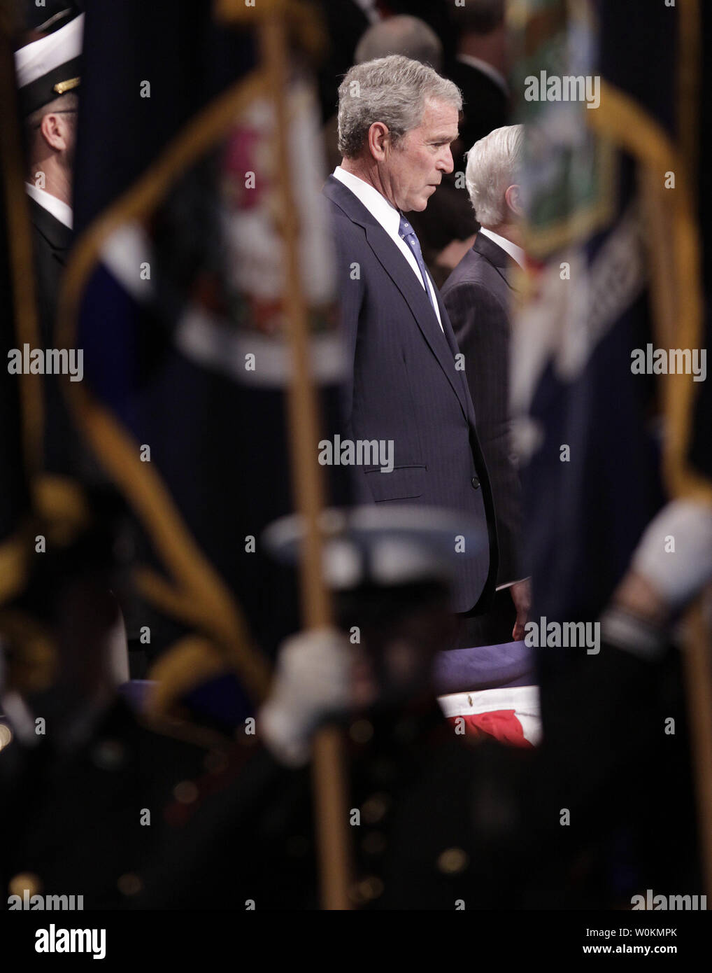 U.S. President George W. Bush stands during a military appreciation ...